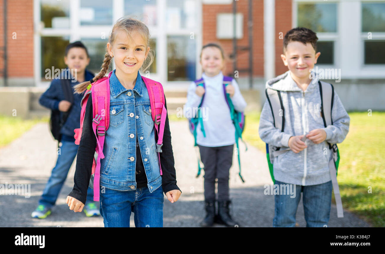 students outside school standing together Stock Photo - Alamy