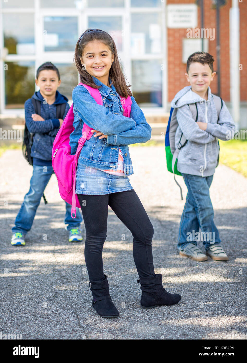 students outside school standing together Stock Photo - Alamy