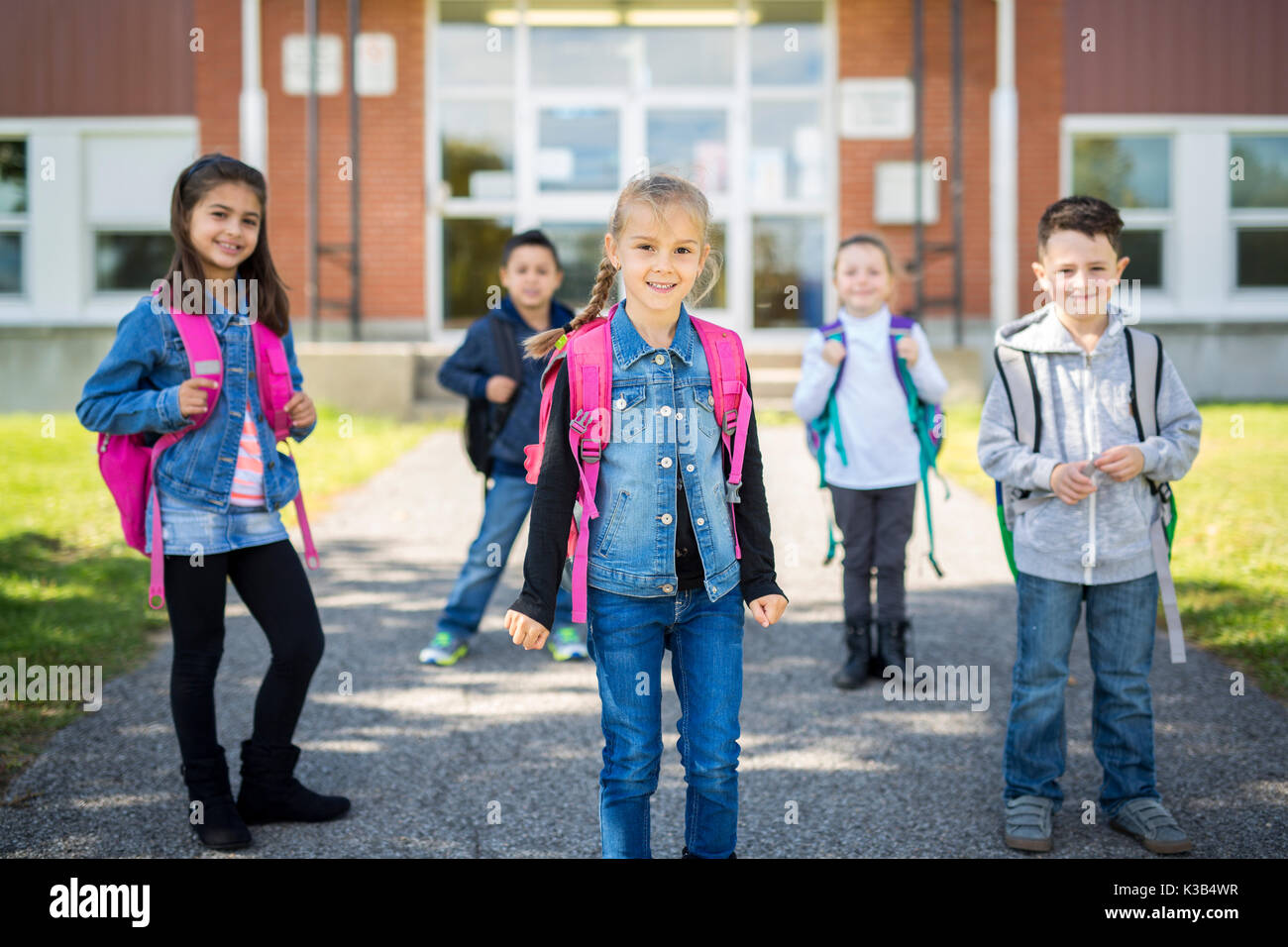 students outside school standing together Stock Photo - Alamy