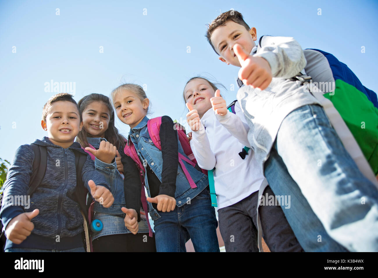 students outside school standing together Stock Photo - Alamy