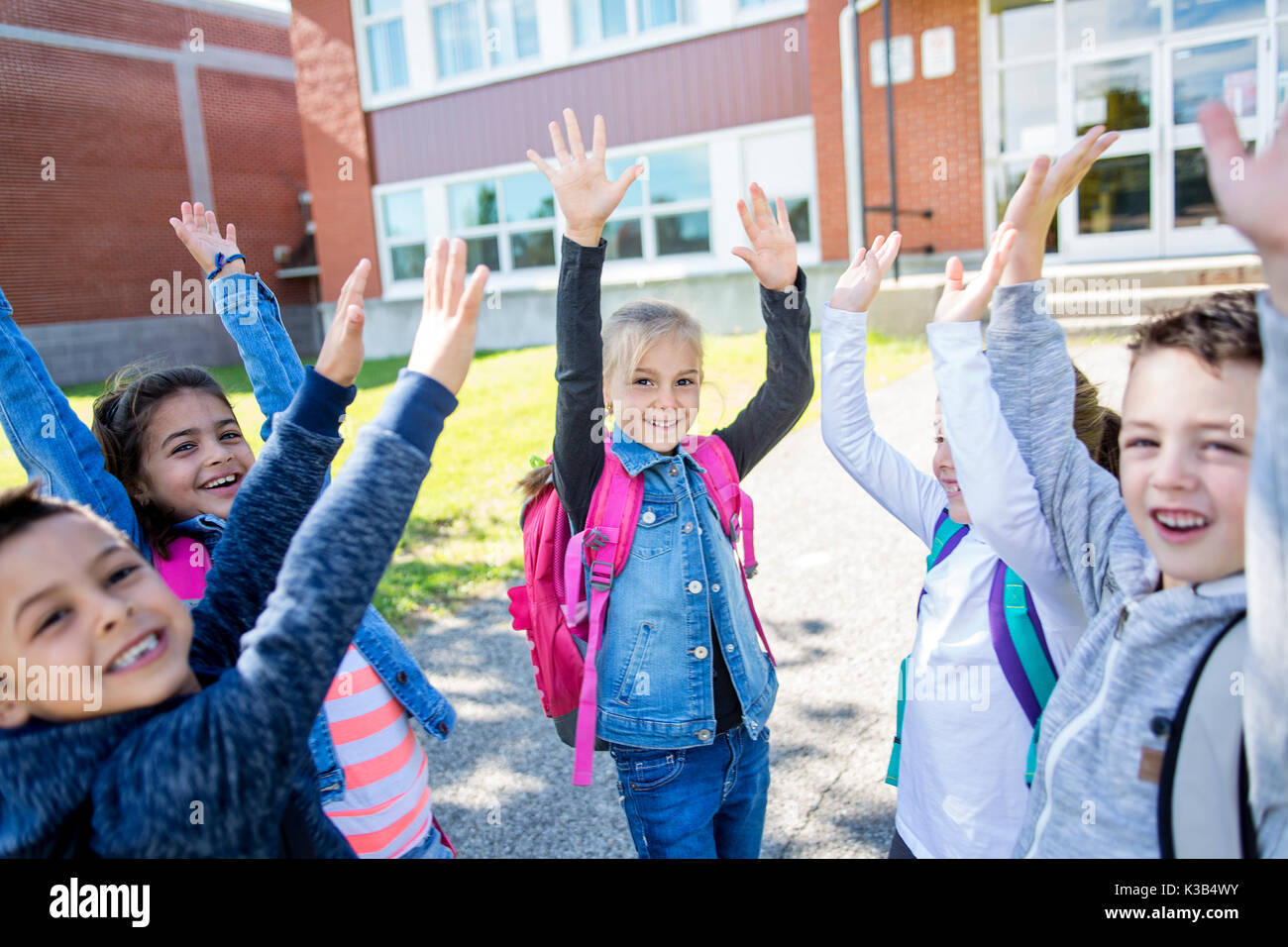 students outside school standing together Stock Photo - Alamy