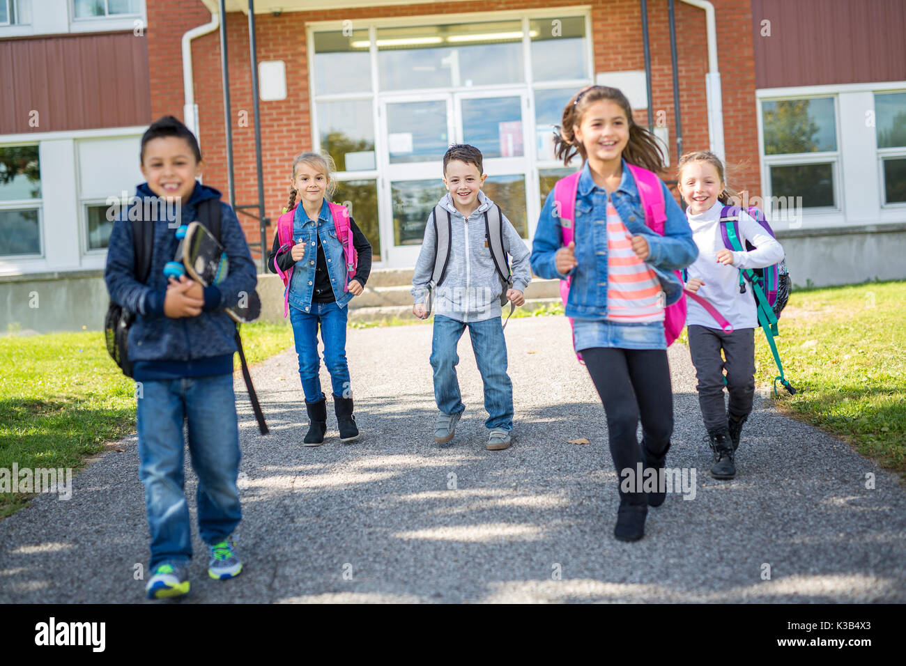 students outside school standing together Stock Photo - Alamy