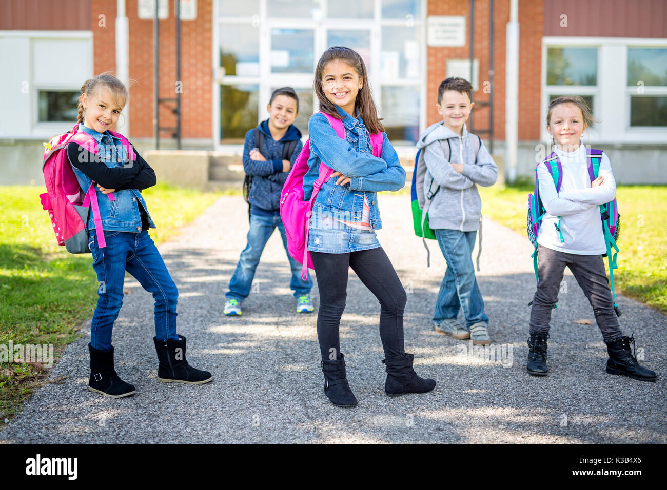students outside school standing together Stock Photo - Alamy