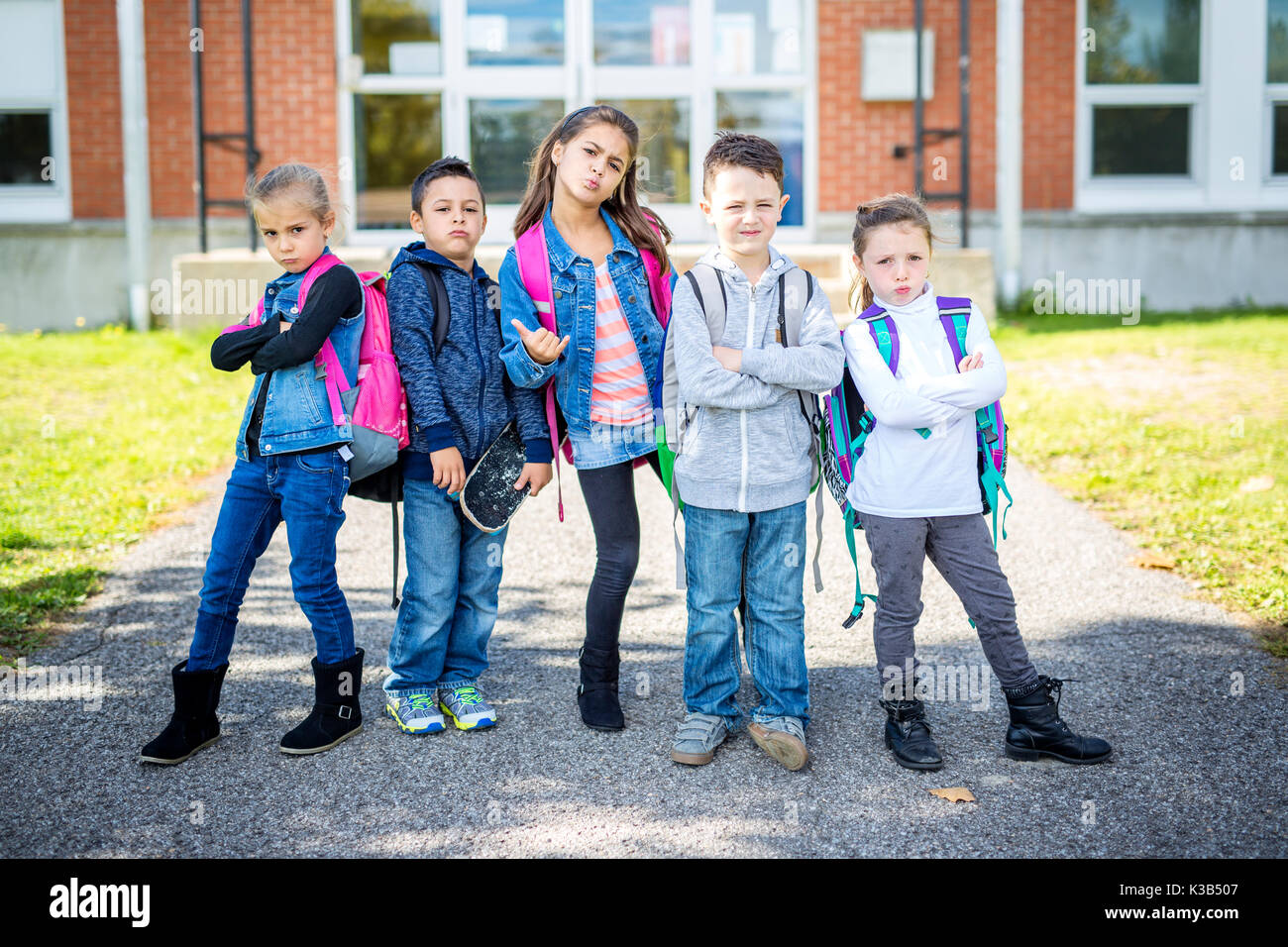 students outside school standing together Stock Photo - Alamy