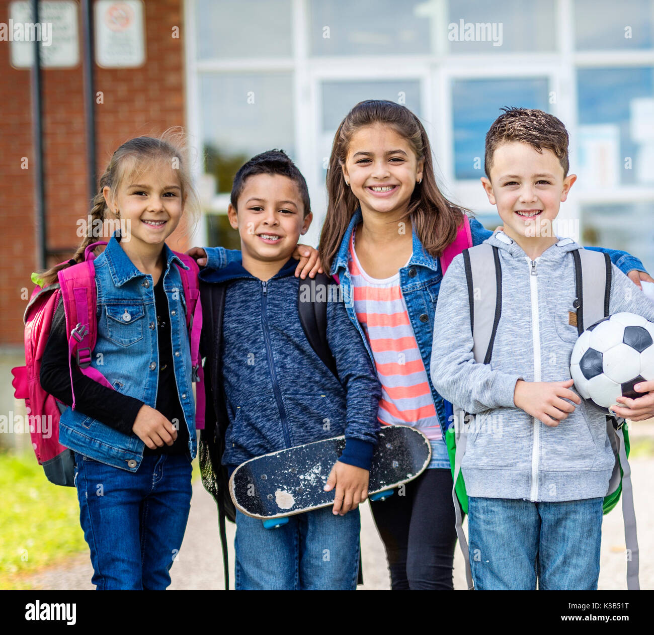 students outside school standing together Stock Photo - Alamy