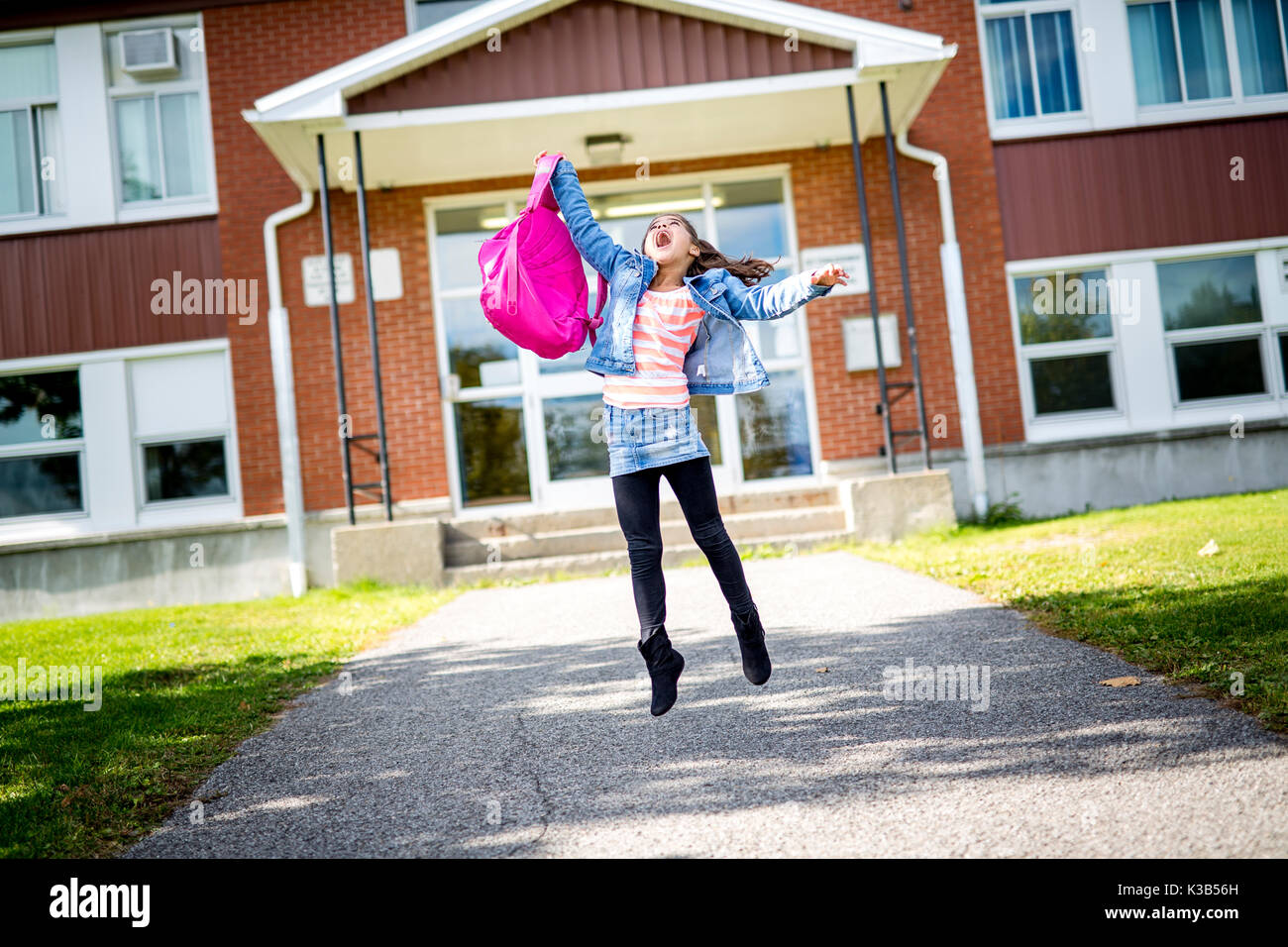 elementary student going back to school Stock Photo - Alamy