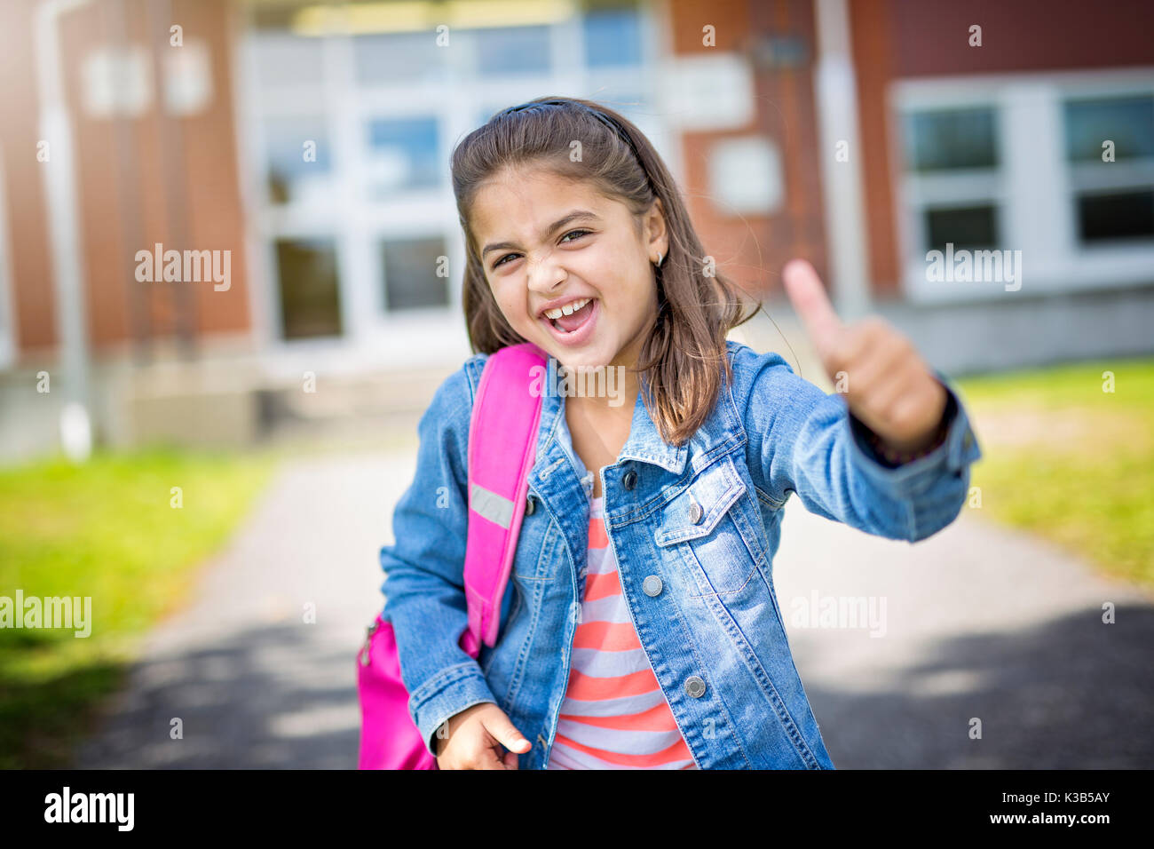elementary student going back to school Stock Photo - Alamy