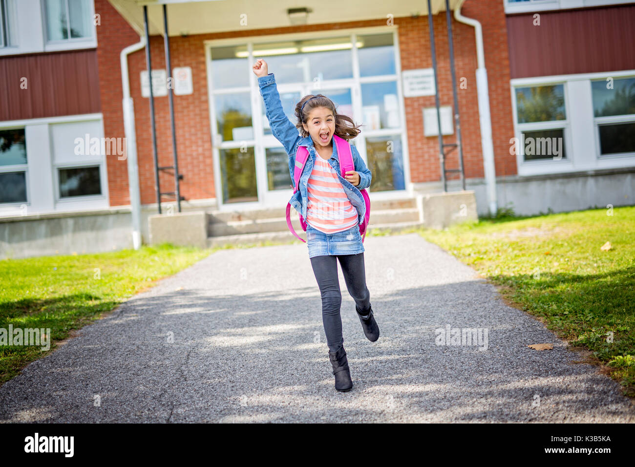 elementary student going back to school Stock Photo - Alamy