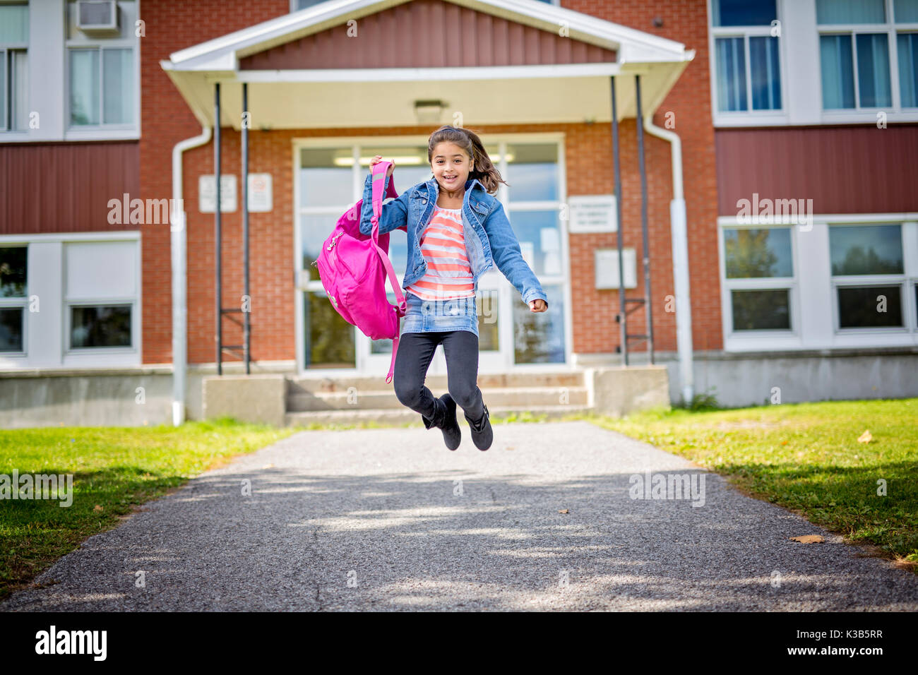 elementary student going back to school Stock Photo - Alamy