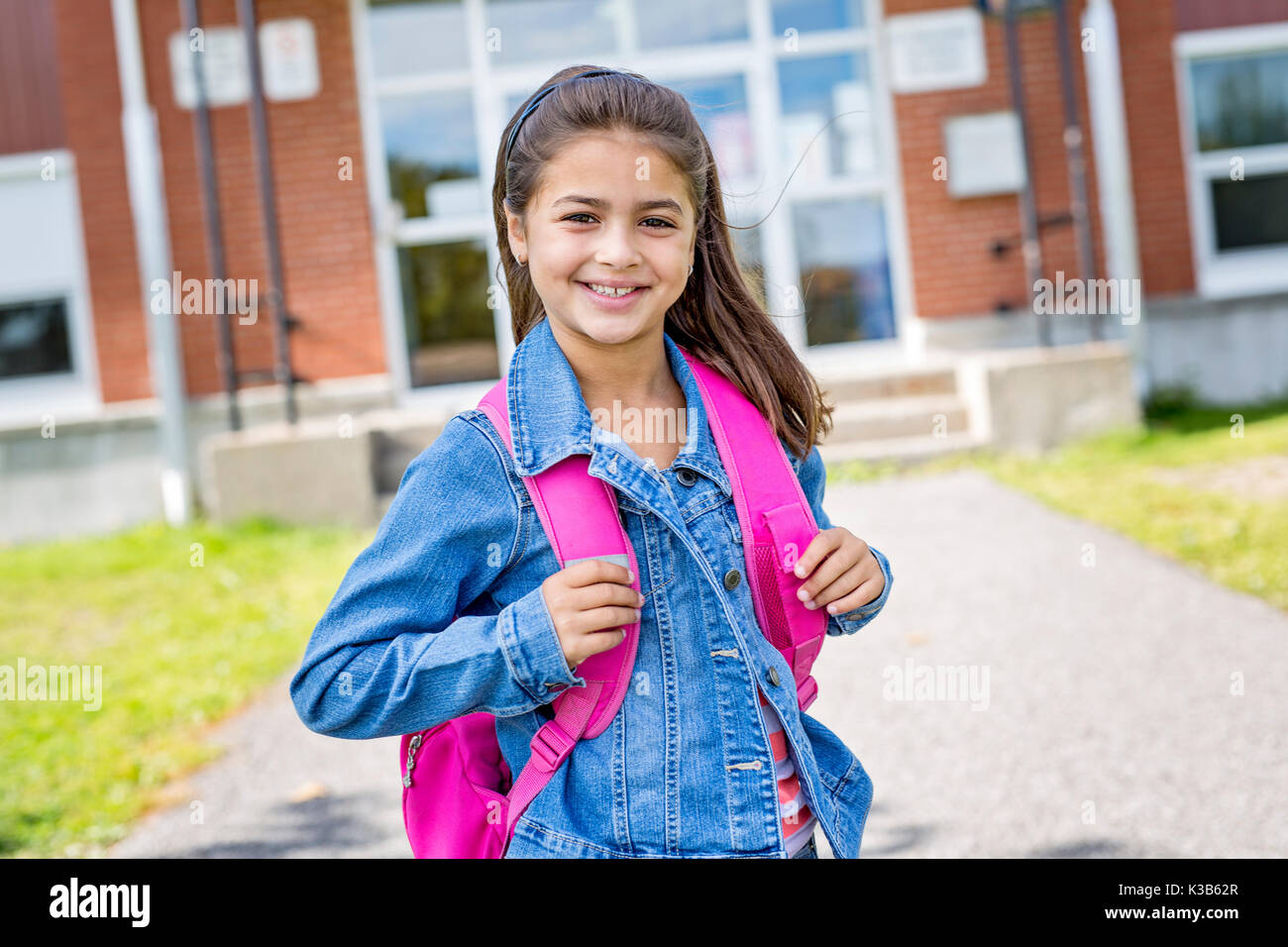 elementary student going back to school Stock Photo - Alamy