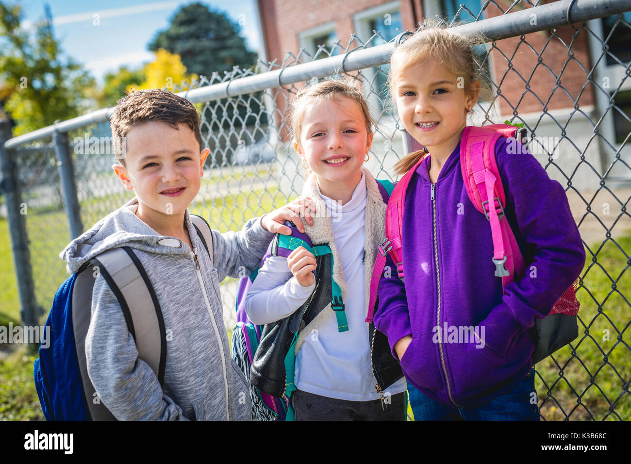 students outside school standing together Stock Photo - Alamy