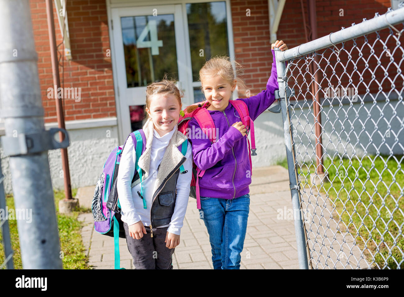 Two grade school girls hi-res stock photography and images - Alamy
