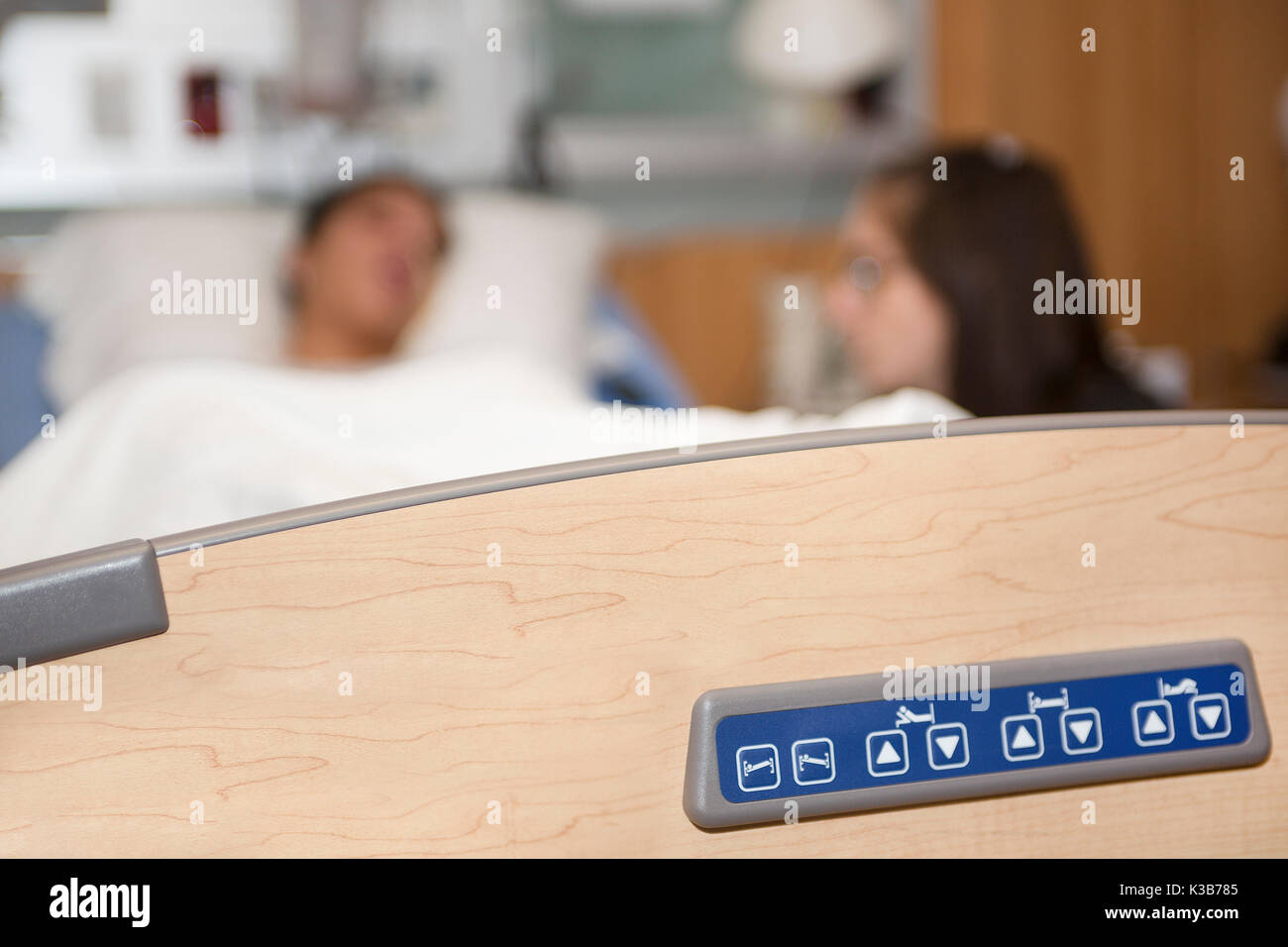 Sick patient lying on bed in hospital for medical background Stock ...
