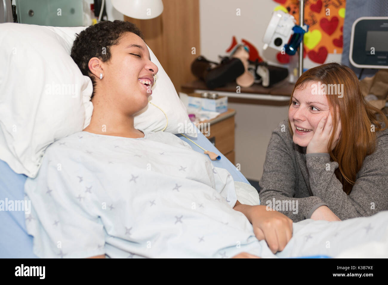 Sick patient lying on bed in hospital for medical background Stock ...
