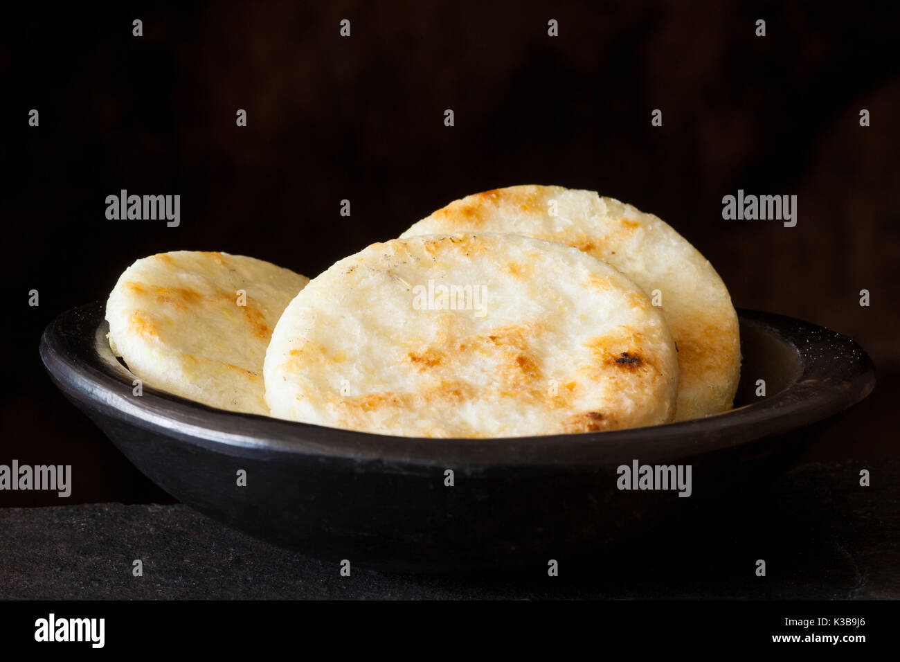 Roasted traditional Colombian white corn arepa Stock Photo - Alamy