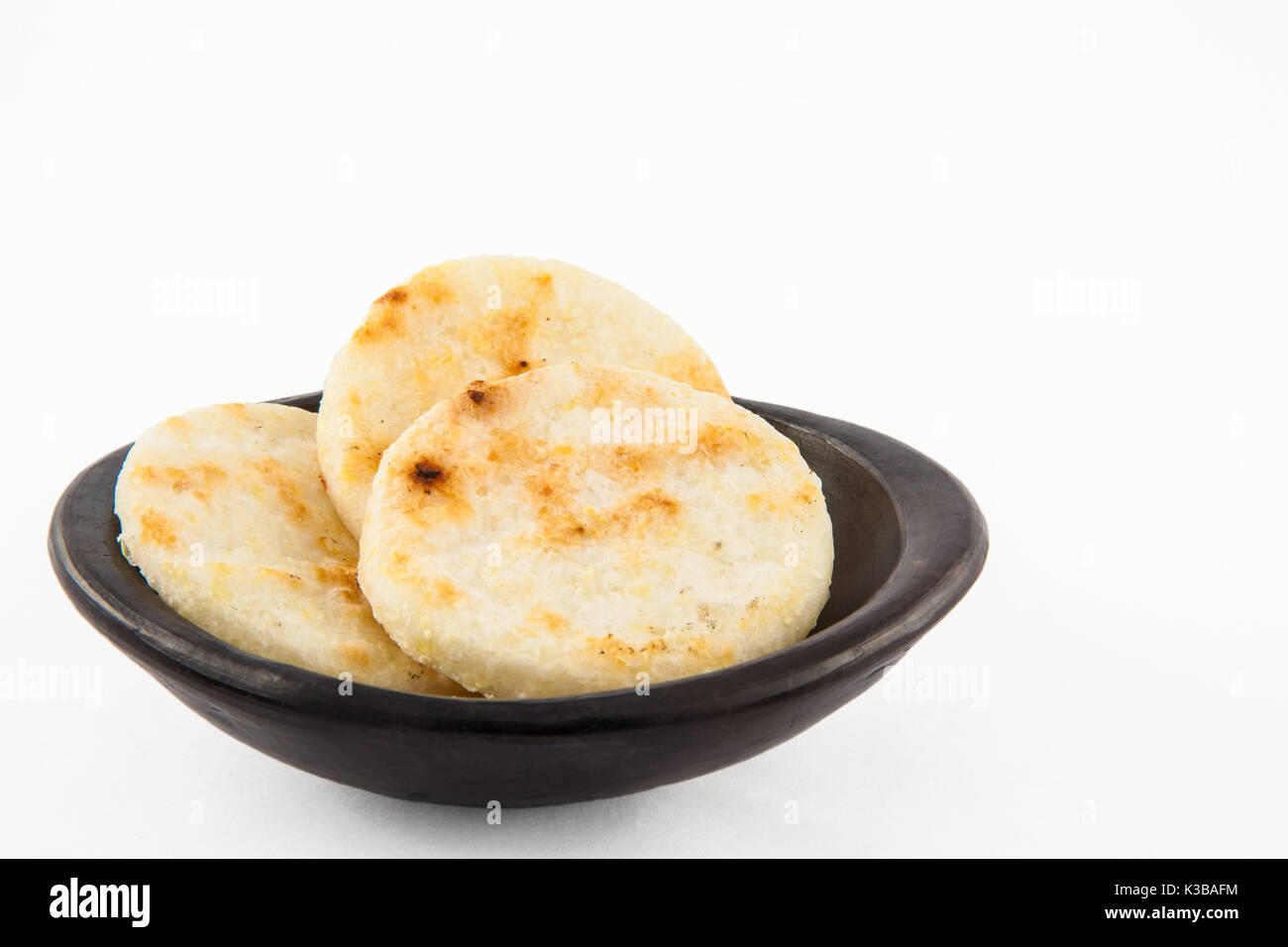 Roasted traditional Colombian white corn arepa Stock Photo - Alamy