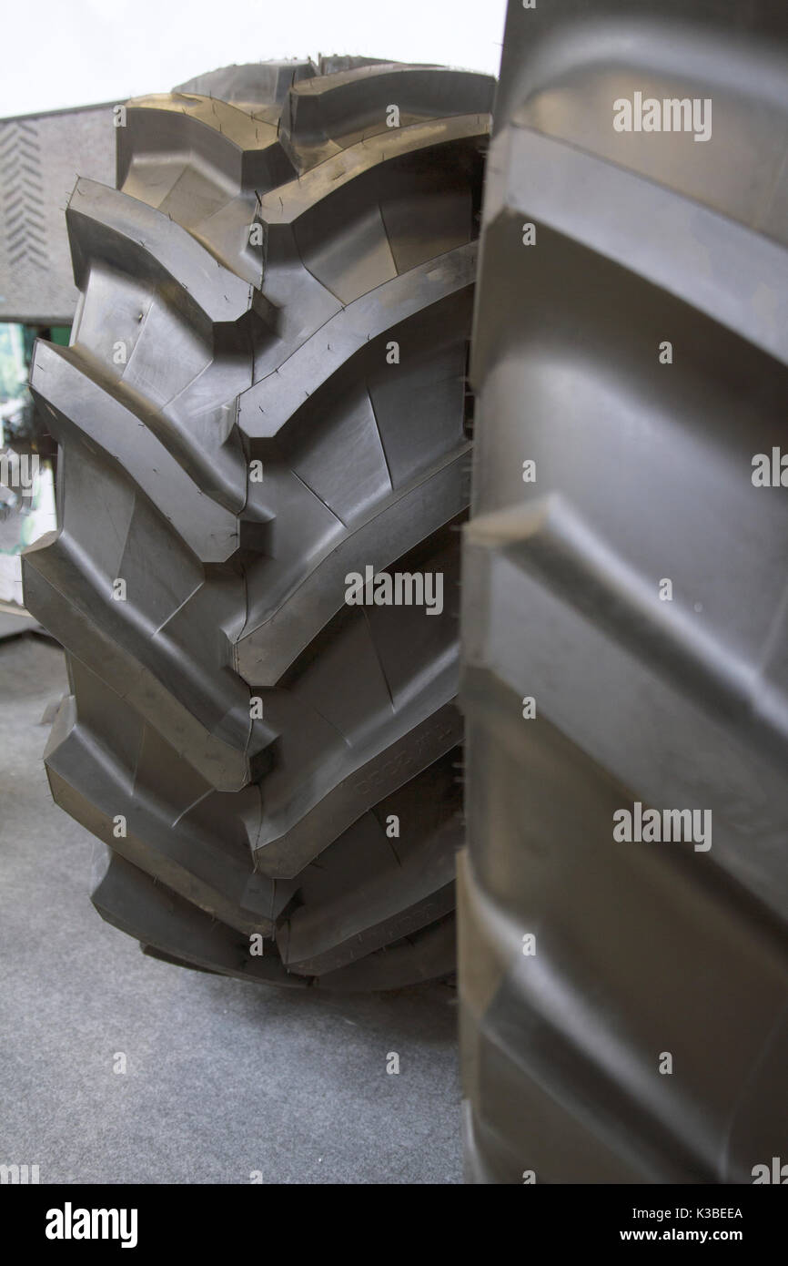 Big tractor tires - rubber wheels for agricultural tractor Stock Photo ...