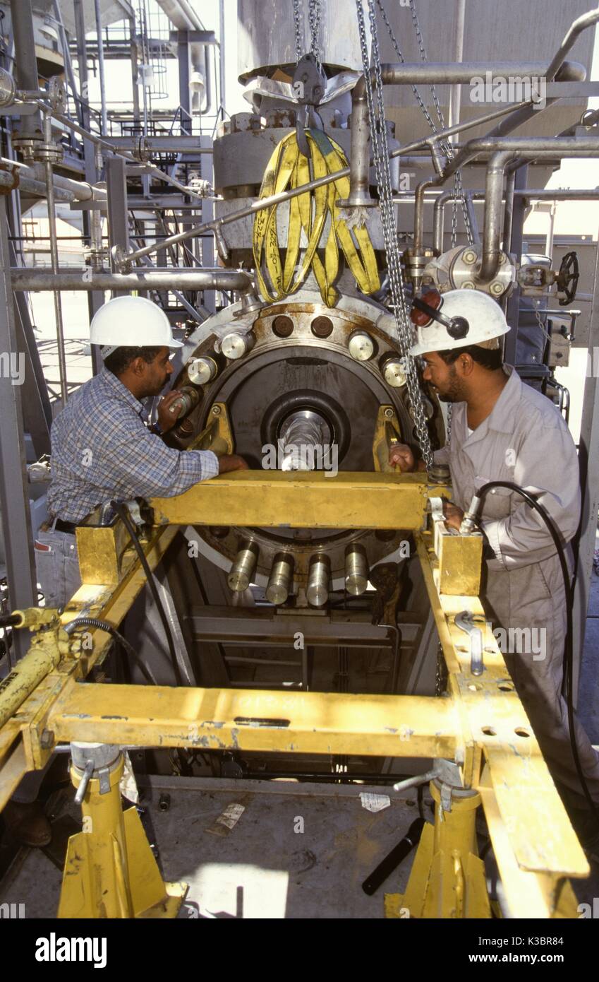 Oil rig drill floor action on an oil and gas exploration rig in the ...