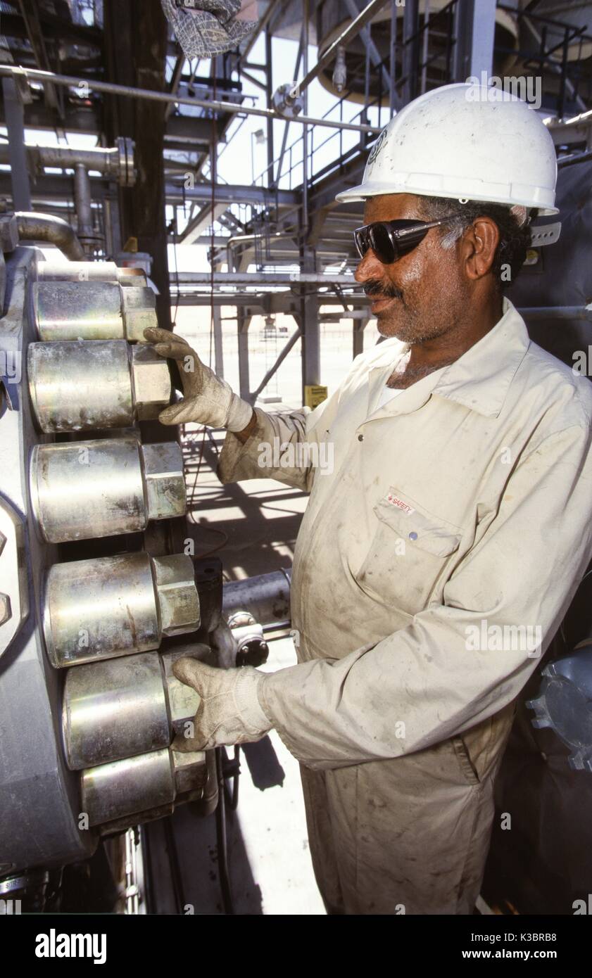 Oil rig drill floor action on an oil and gas exploration rig in the ...
