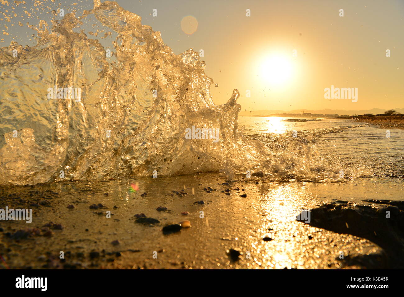 Caught by wave beach hi-res stock photography and images - Alamy