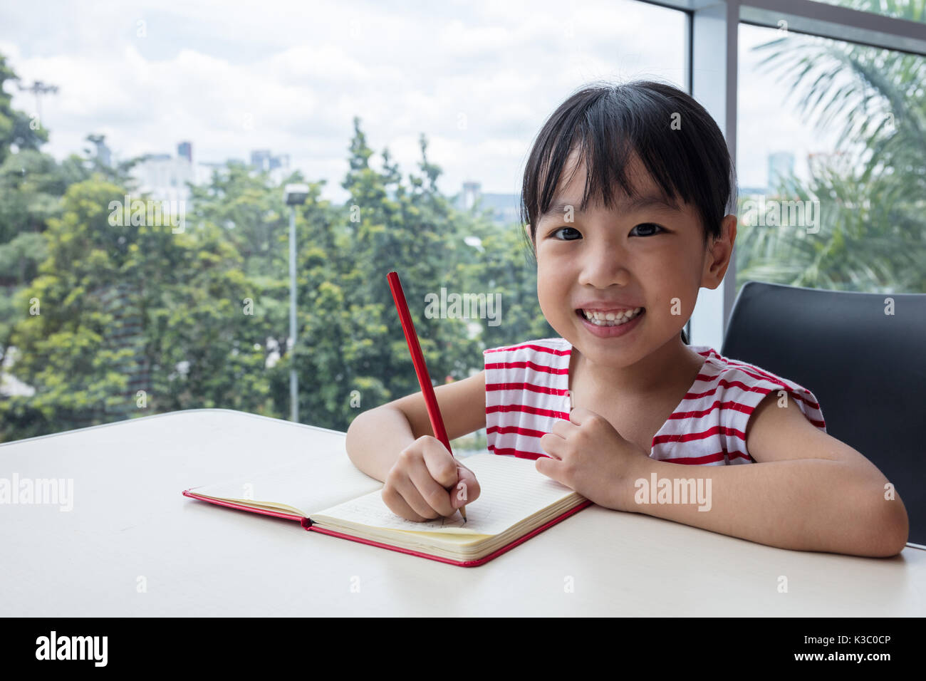 Child restaurant writing hi-res stock photography and images - Alamy
