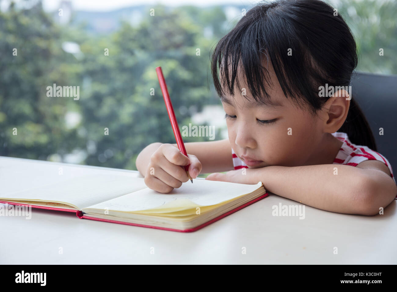 Child writing letter painting hi-res stock photography and images - Alamy