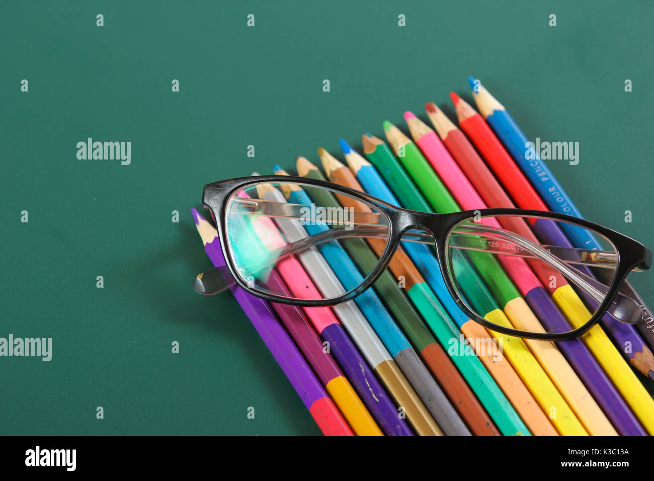 colorful pencil on writing board Stock Photo - Alamy