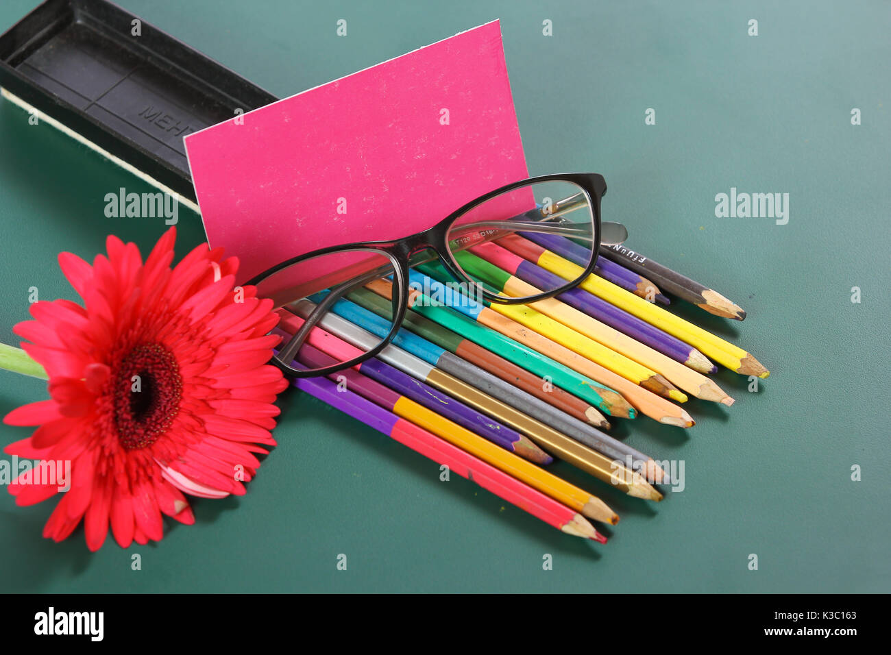 colorful pencil on writing board Stock Photo - Alamy