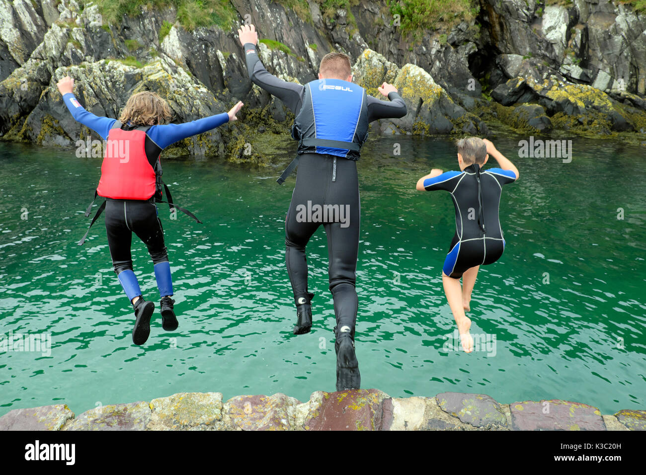 Children In Wetsuits High Resolution Stock Photography and Images - Alamy
