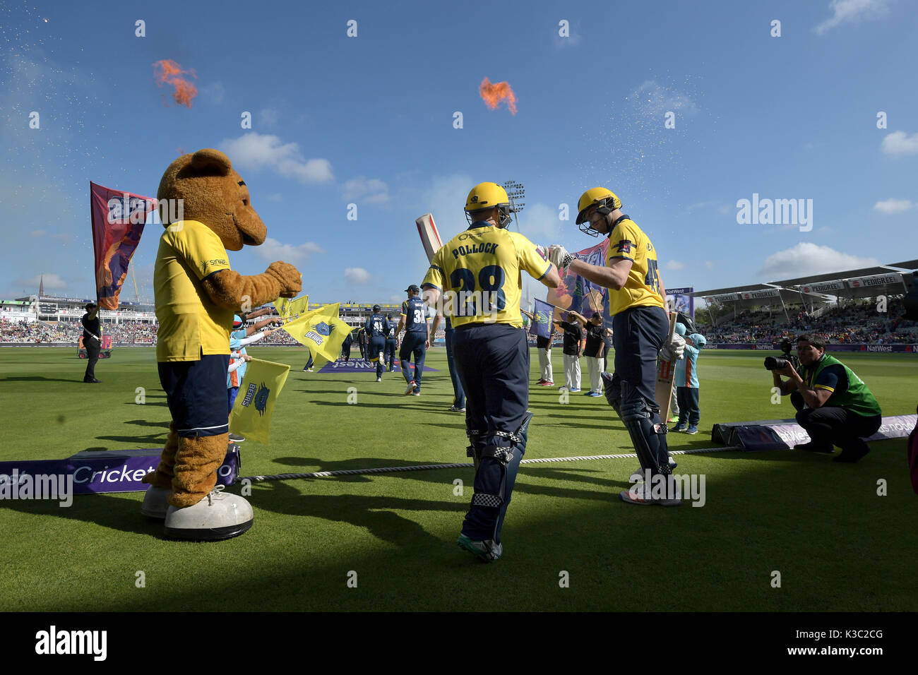 Birmingham's Ed Pollock (left) and Dominic Sibley head out to open the ...