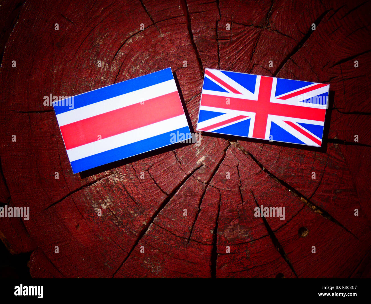 Costa Rican flag with British flag on a tree stump isolated Stock Photo ...