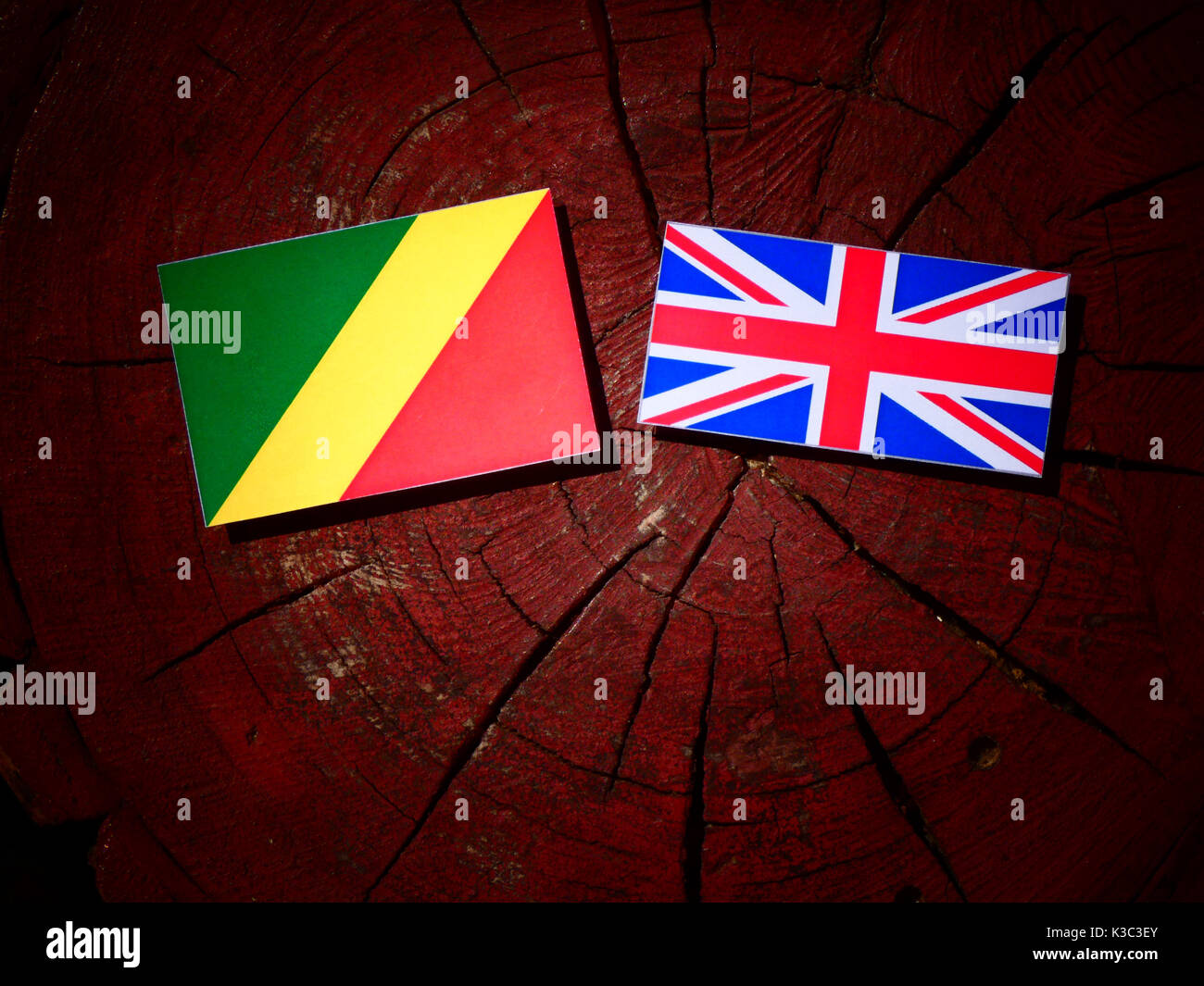 Republic of the Congo flag with British flag on a tree stump isolated ...