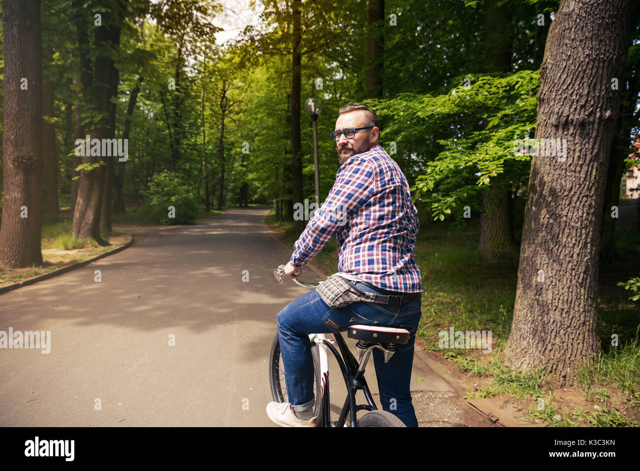 Handsome young man turning around hi-res stock photography and images ...