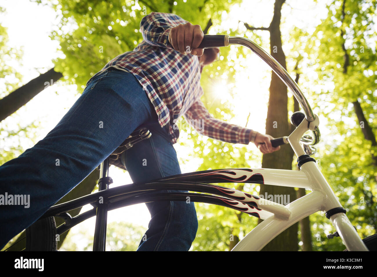 Bottom view young man riding hi-res stock photography and images - Alamy