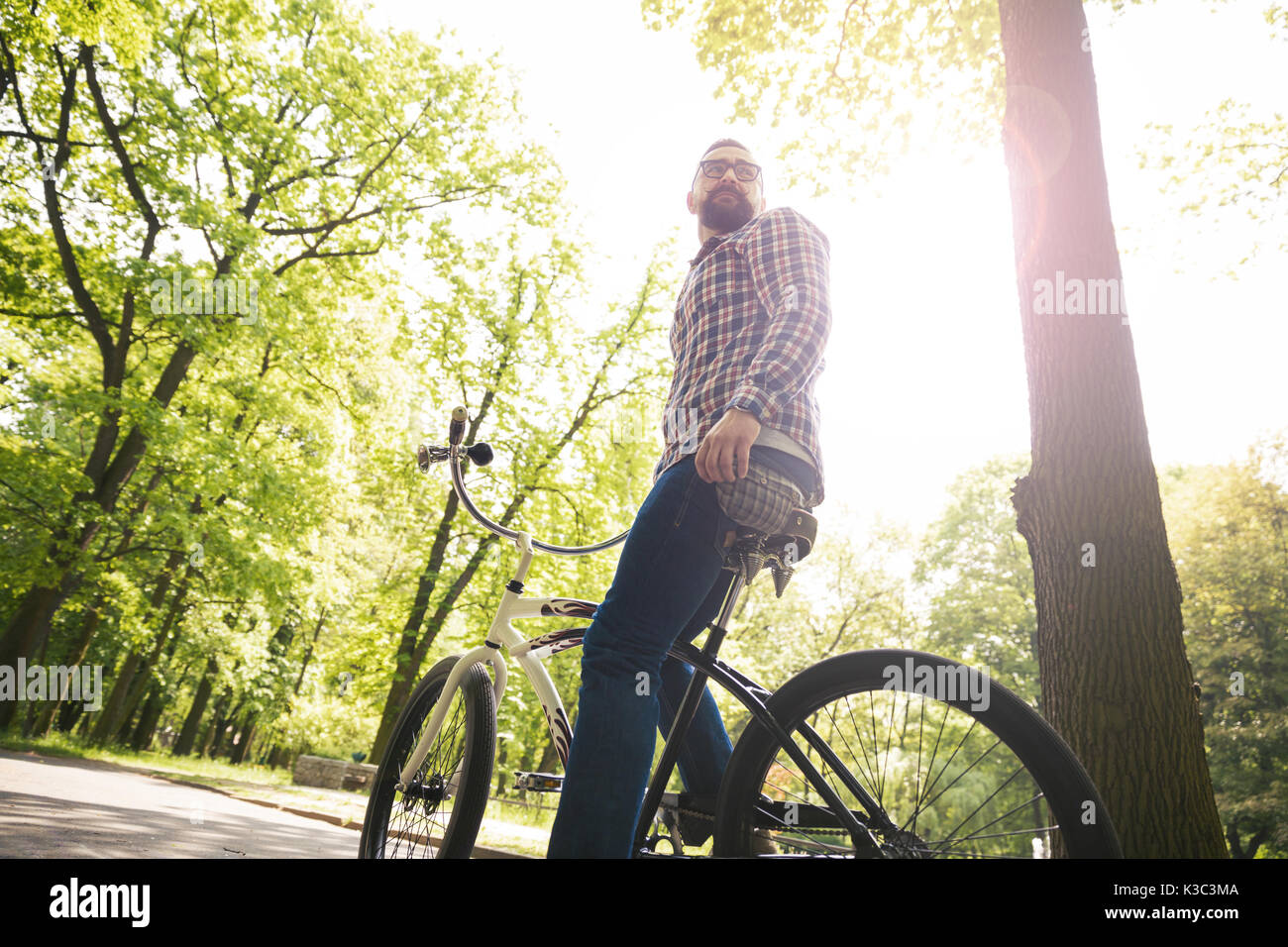 Handsome young man turning around hi-res stock photography and images ...