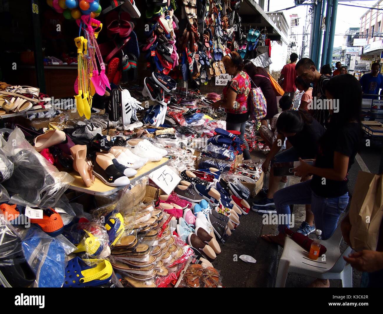 MARIKINA CITY, PHILIPPINES - AUGUST 28, 2017: Assorted slippers and ...