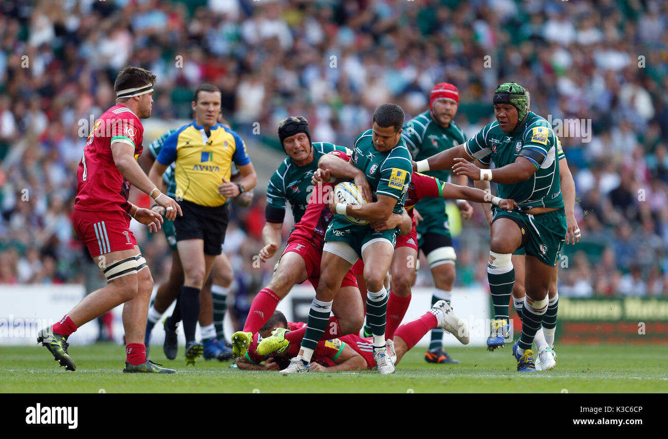 London Irish's Fergus Mulchrone is tackled during the Aviva Premiership ...