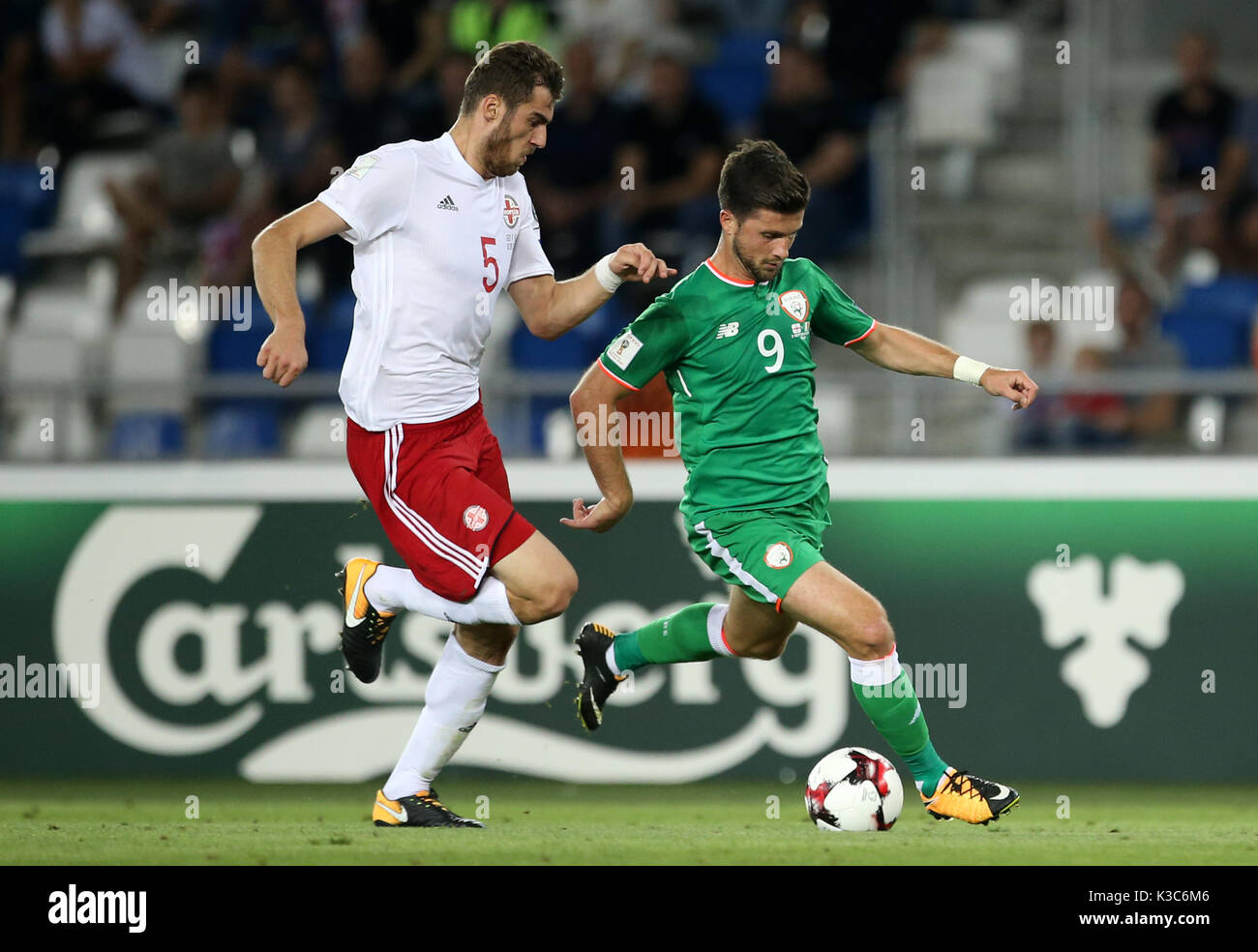 Georgia's Solomon Kverkvelia (left) and Republic of Ireland's Shane ...