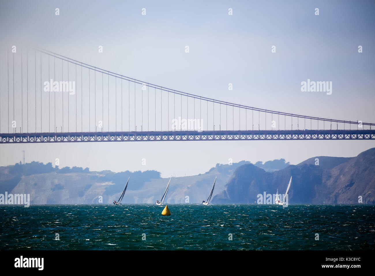 Golden gate bridge under fog hi-res stock photography and images - Alamy