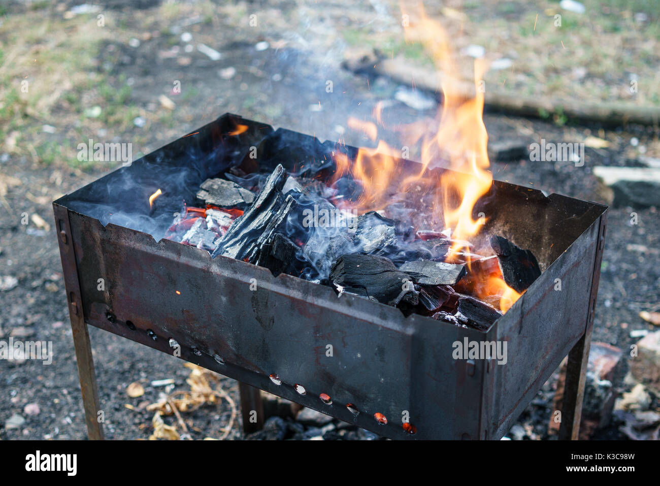 Fire in barbecue, outdoor Stock Photo - Alamy