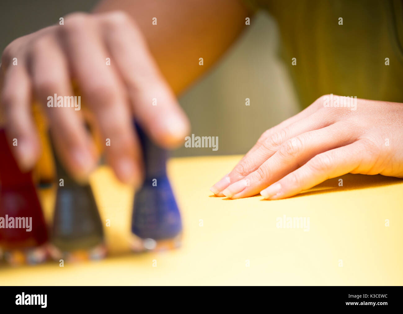 Picking the right color for nails Stock Photo - Alamy