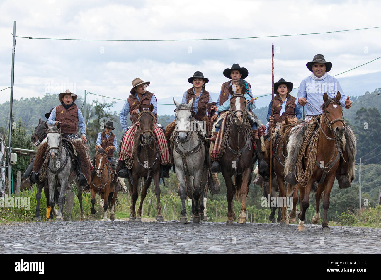 May 27, 2017 Sangolqui, Ecuador: cowboys arriving on horse back to a ...
