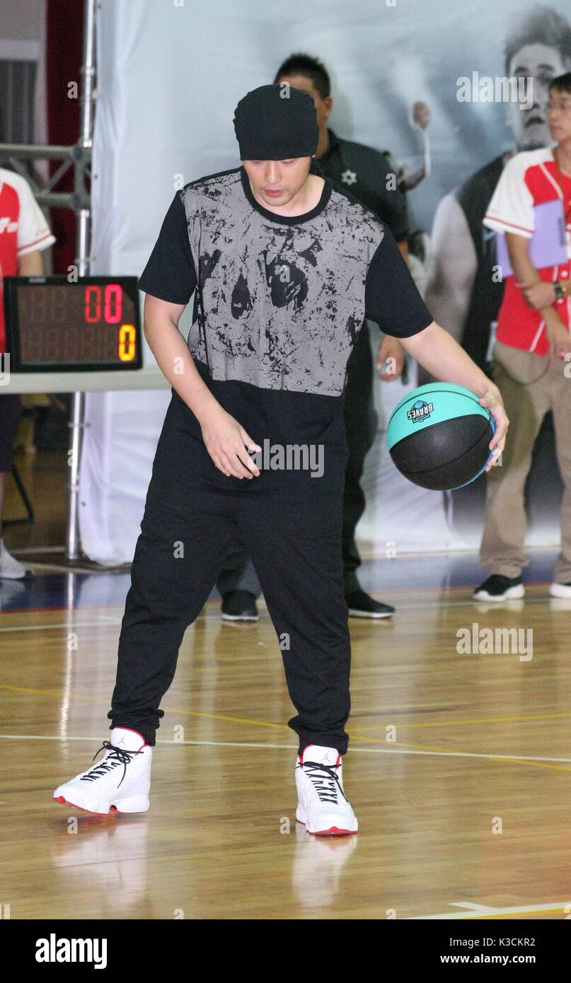 Taiwanese singer Jay Chou attends a public basketball activity in ...