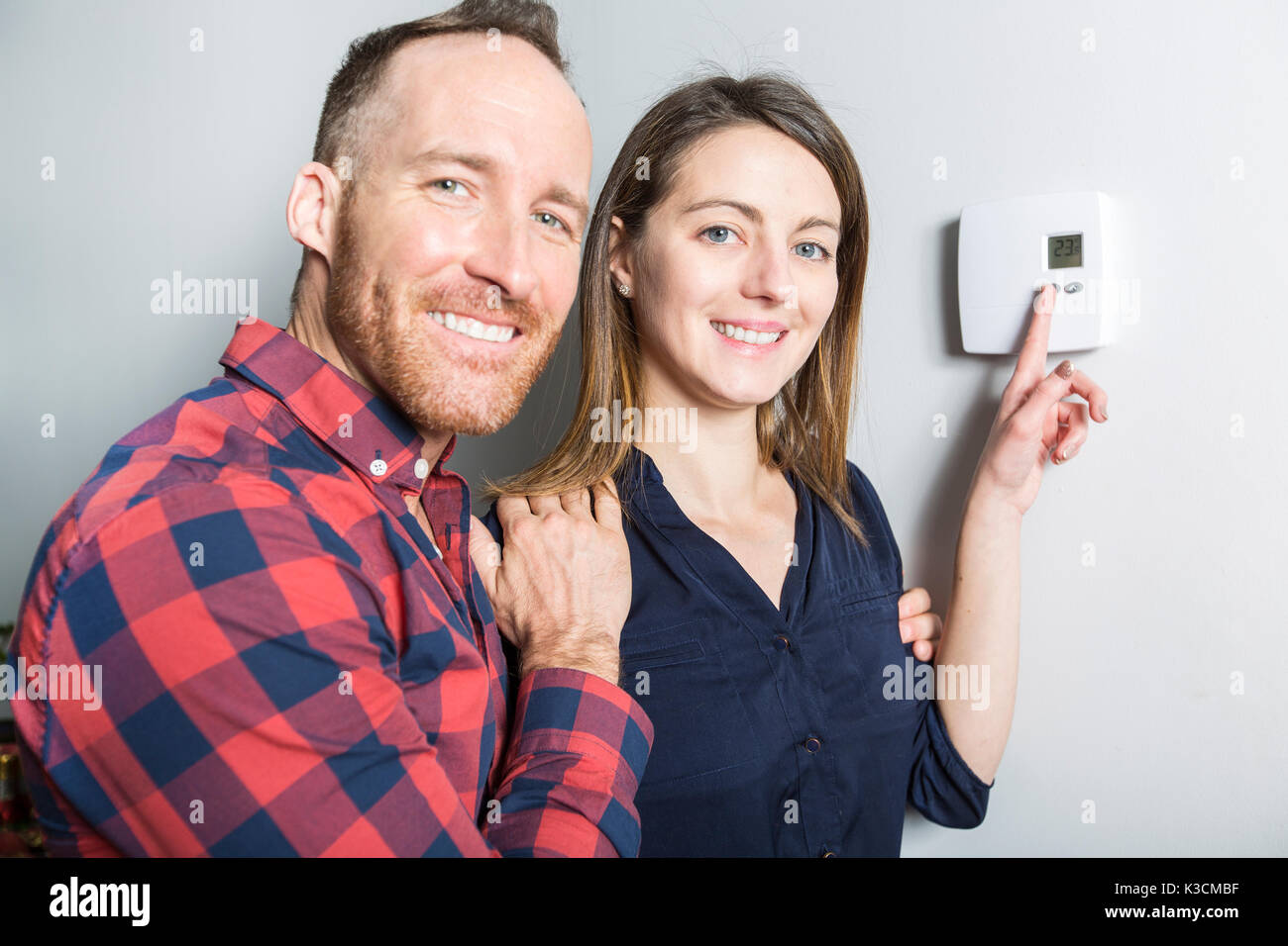 Turning down temperature hi-res stock photography and images - Alamy