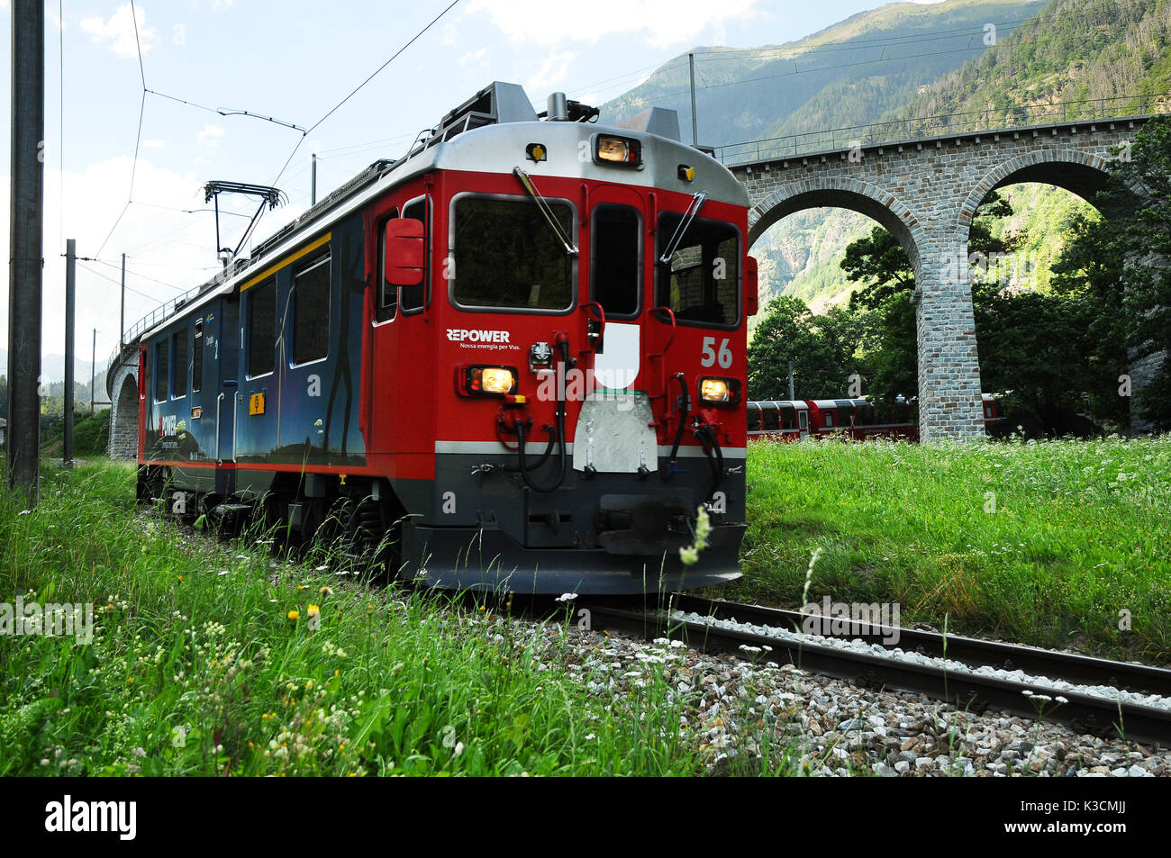 Swiss Red Train Bernina Express pass on Brusio Viaduct, Italy ...