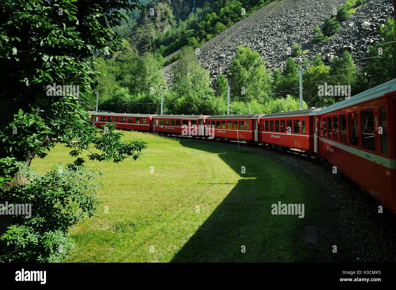 Swiss Red Train Bernina Express pass on Brusio Viaduct, Italy ...