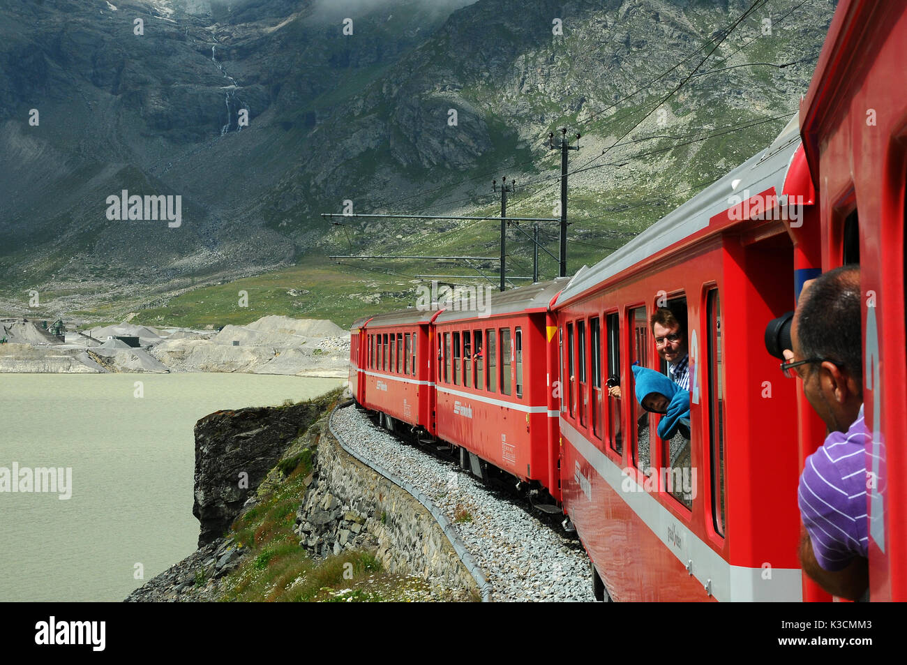 Famous red alpine train Bernina Express from St.Moritz to Tirano ...