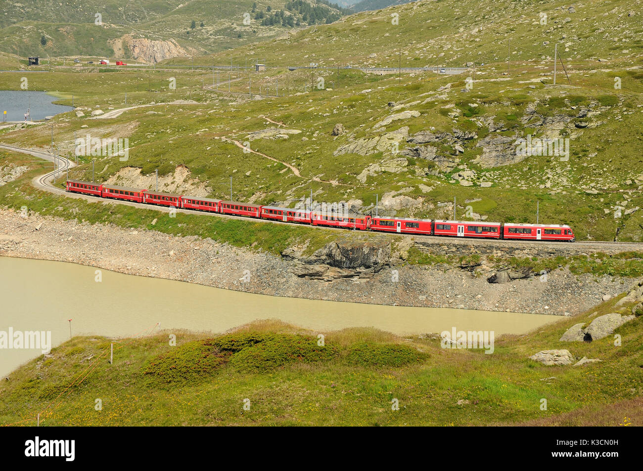 Famous red alpine train Bernina Express from St.Moritz to Tirano ...
