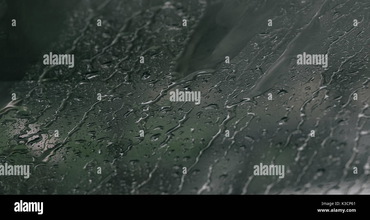 Close up of outside view through car window with water drops Stock ...