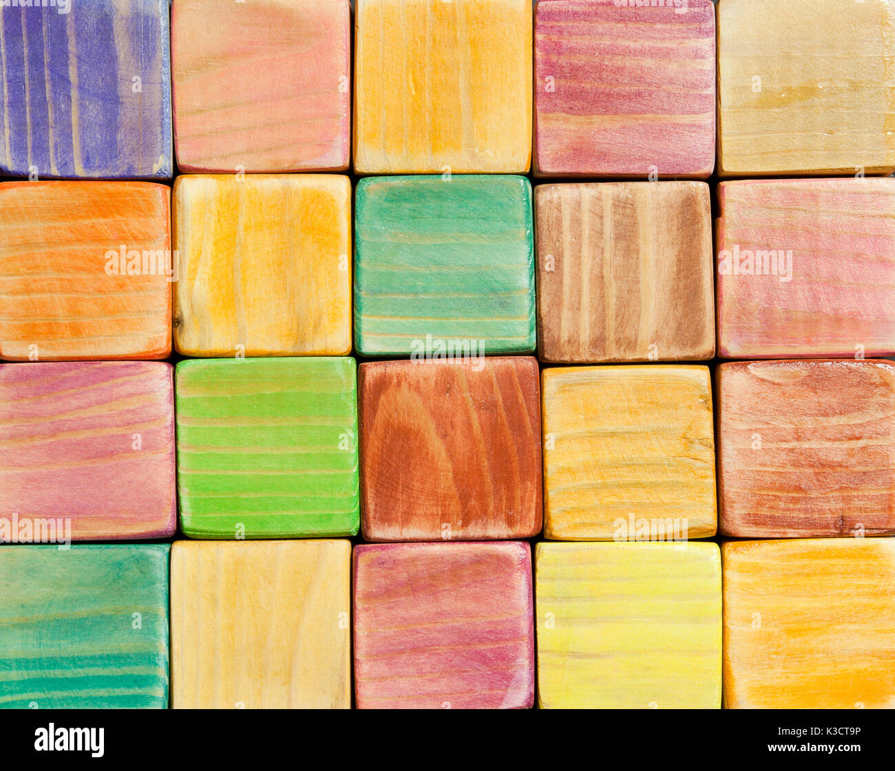 Wooden color toy blocks background Stock Photo - Alamy
